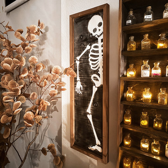 Wooden Framed Leaning Skeleton Art - Decor Steals
